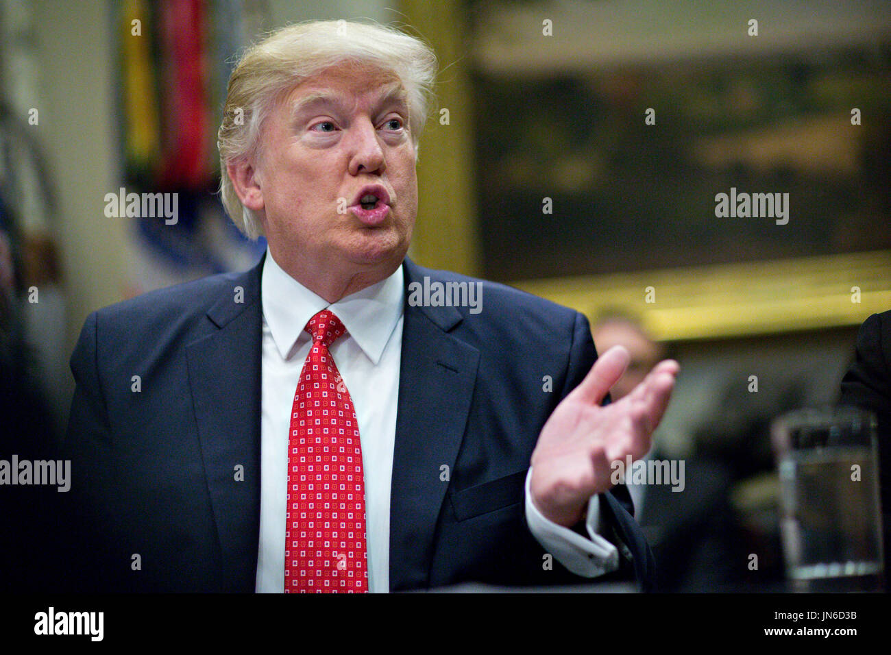 U.S. President Donald Trump speaks as he meets with county sheriffs ...