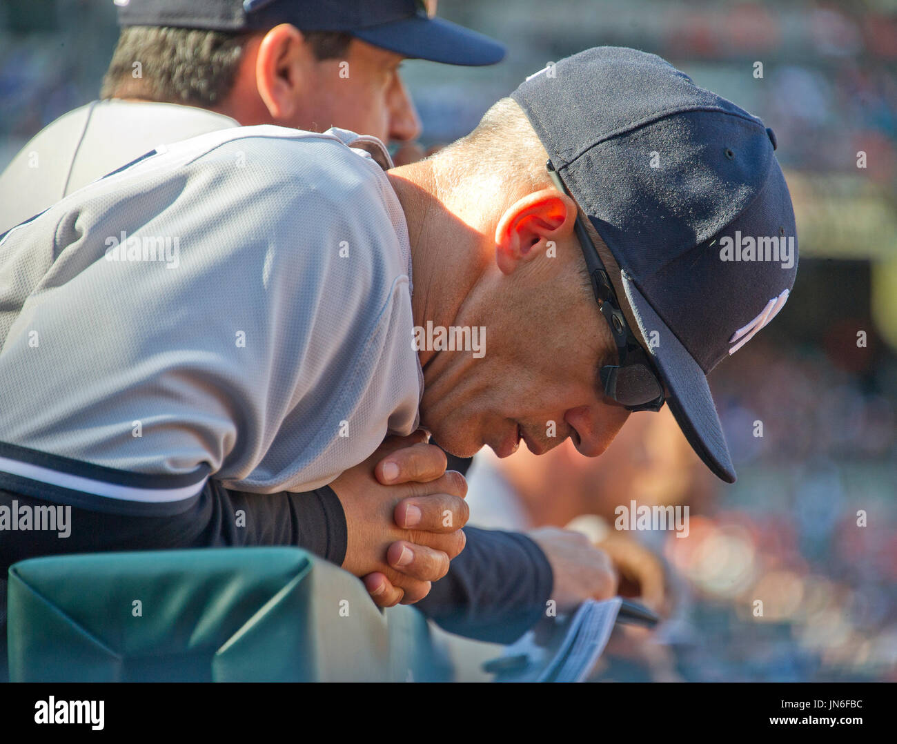 New York Yankees manager Joe Girardi (28) seems to be praying during ...