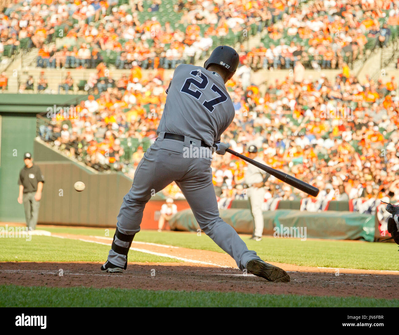 New York Yankees catcher Austin Romine (27) hits a sacrifice fly to ...