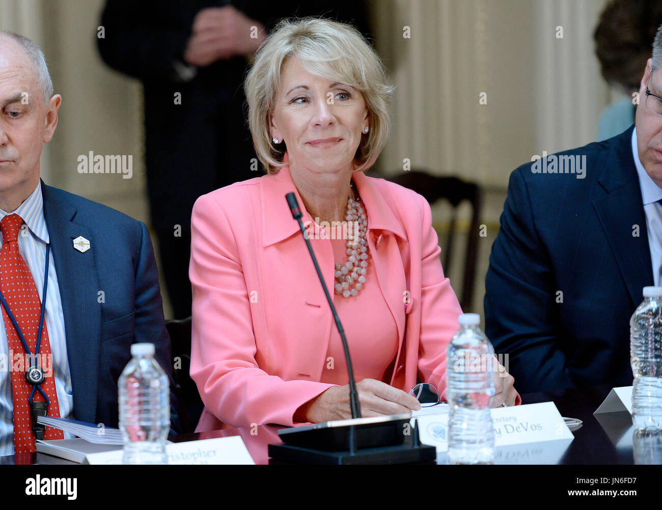 United States Secretary of Education Betsy DeVos listens as US ...