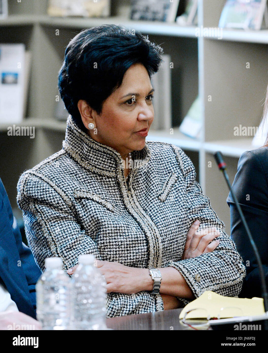 Indra Nooyi, CEO, Pepsi listens as United States President Donald Trump ...