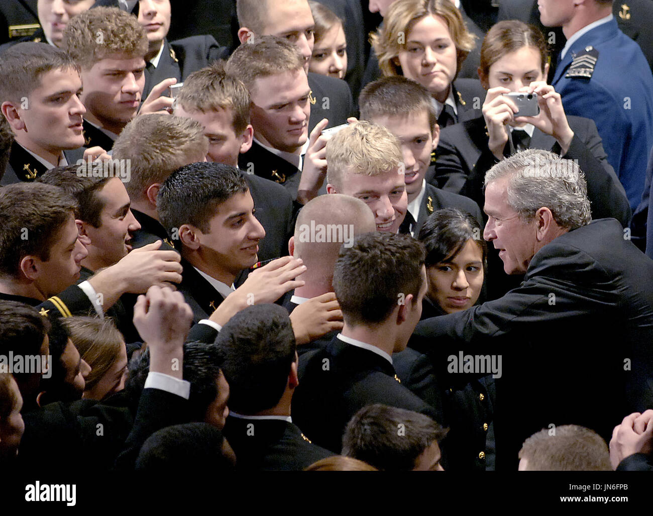 United States President George W. Bush shakes hands with U.S. Navy ...