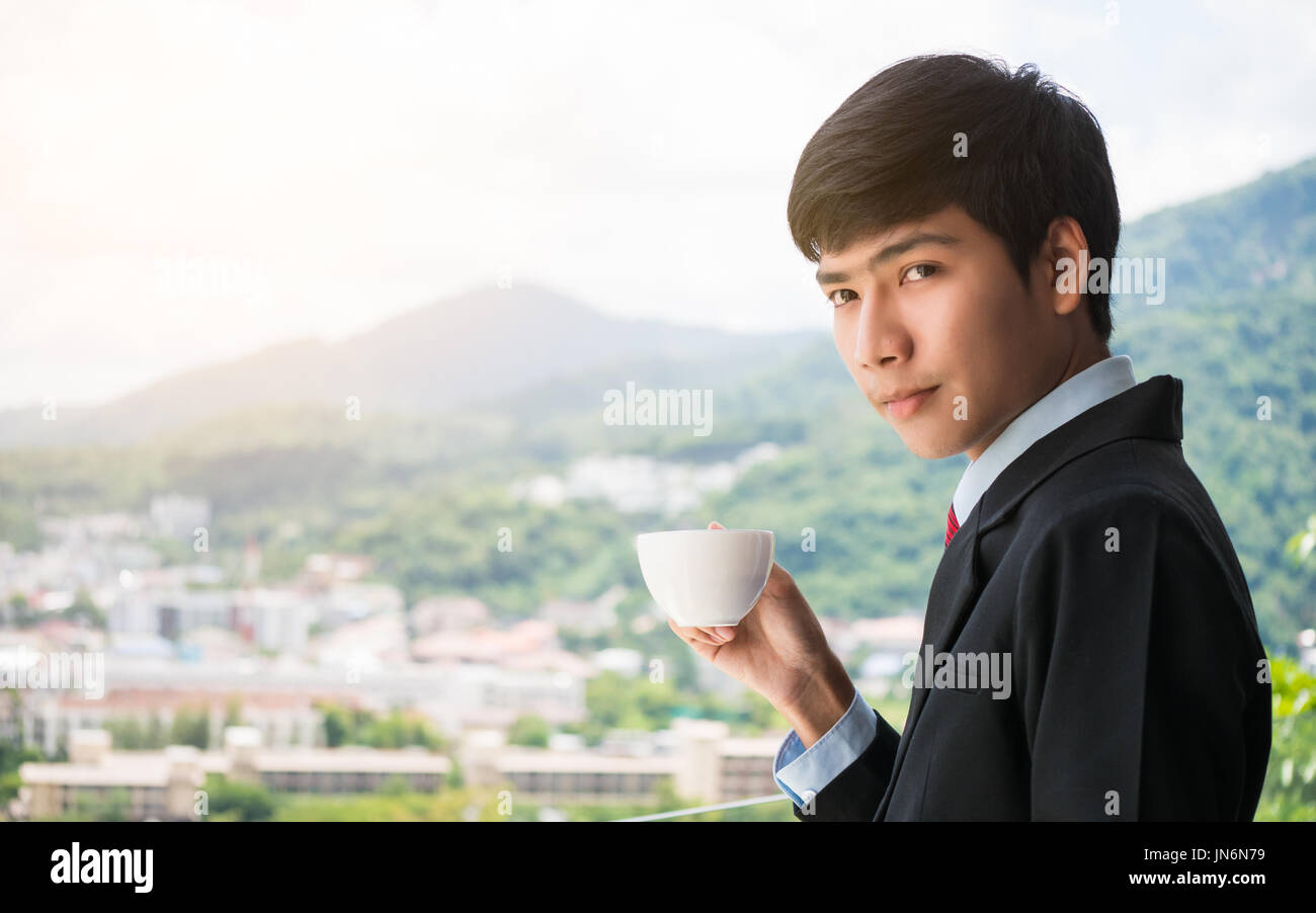 Man standing on cafe terrace hi-res stock photography and images - Alamy