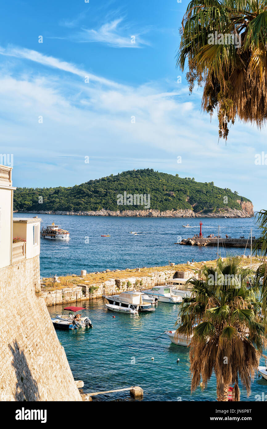Old port with boats and Lokrum Island in Dubrovnik, Croatia Stock Photo ...