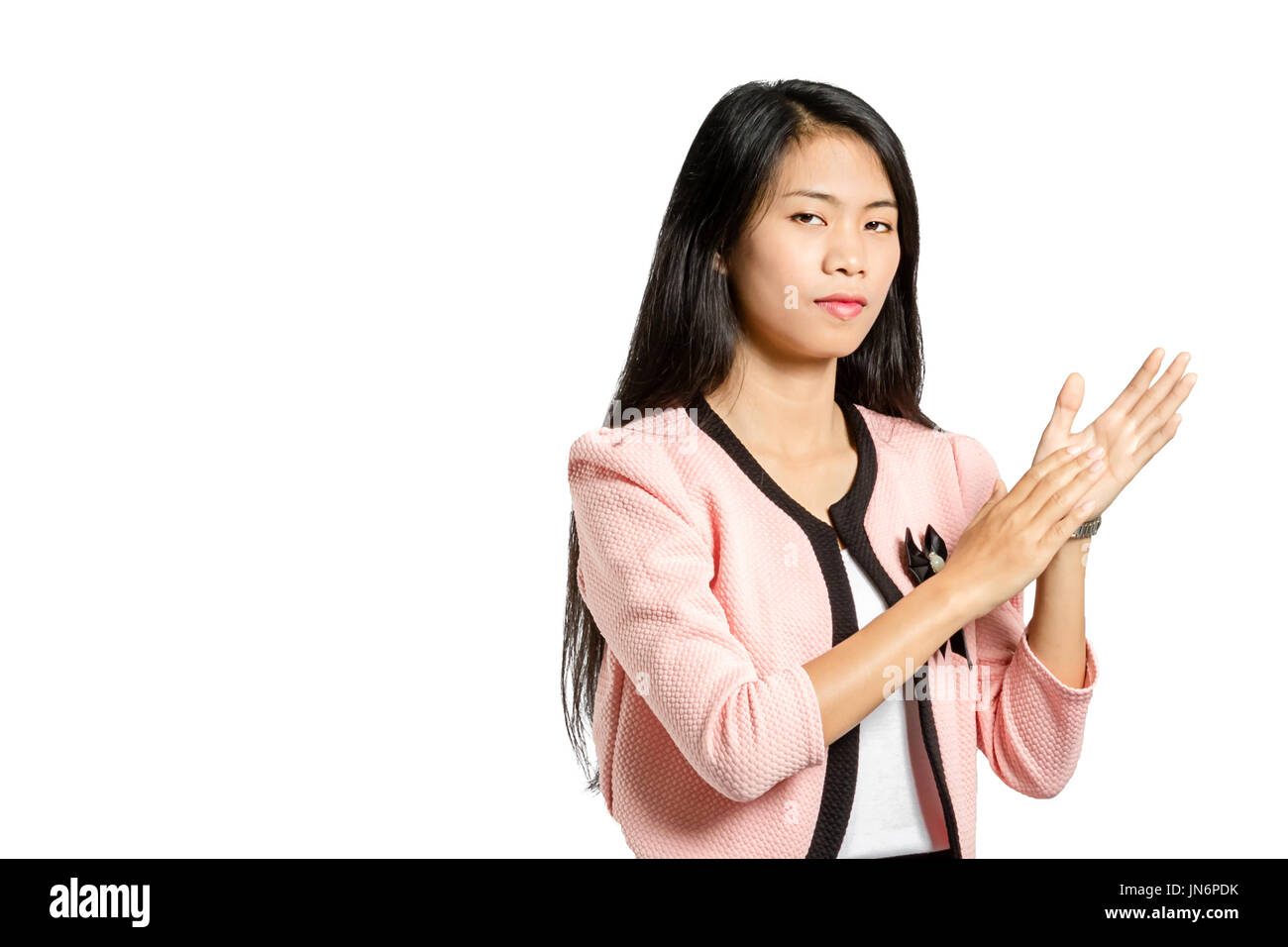 Portrait of a beautiful asian business woman rub hands. Isolated on ...