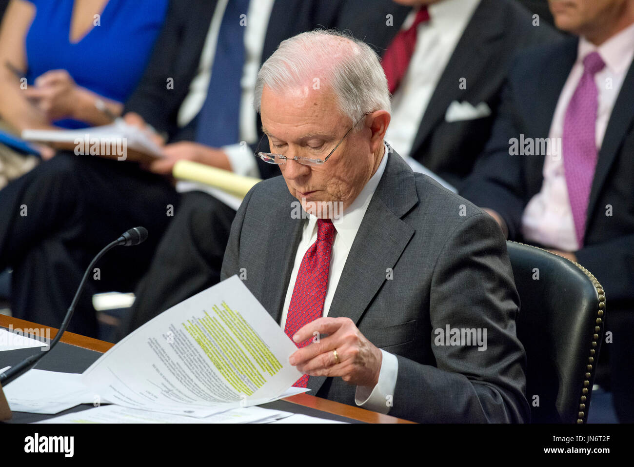 United States Attorney General Jeff Sessions looks over his prepared ...