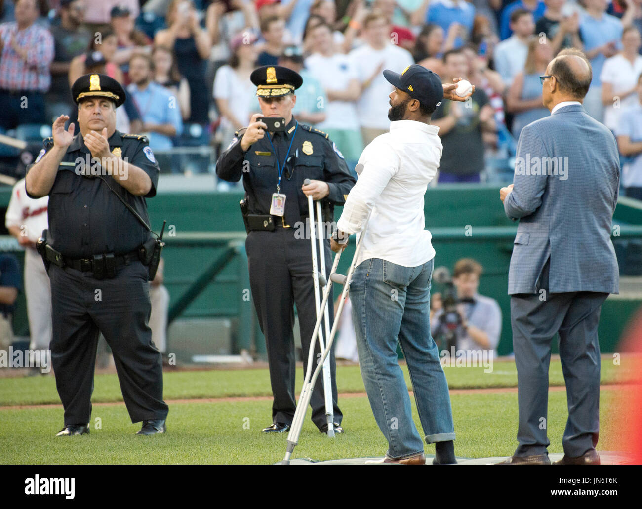 United States Capitol Police Officer David Bailey, second right, who ...