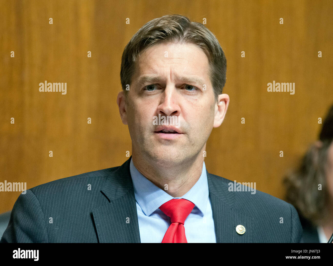 United States Senator Ben Sasse (Republican of Nebraska) listens to ...