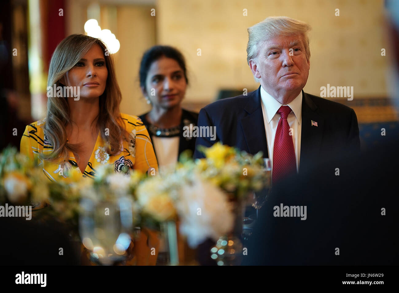 United States President Donald Trump (R) and first lady Melania Trump ...