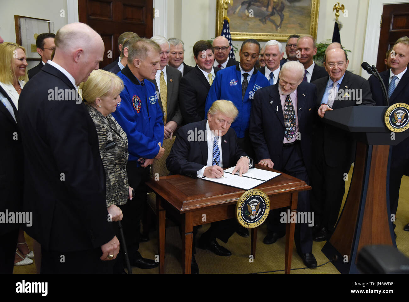 United States President Donald J. Trump, signs an Executive Order to ...