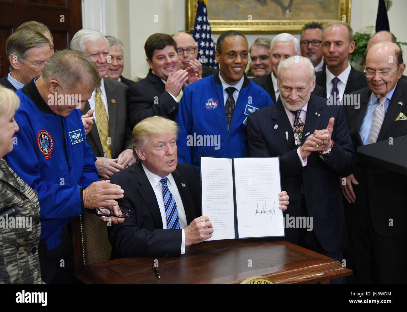 United States President Donald J. Trump, signs an Executive Order to ...