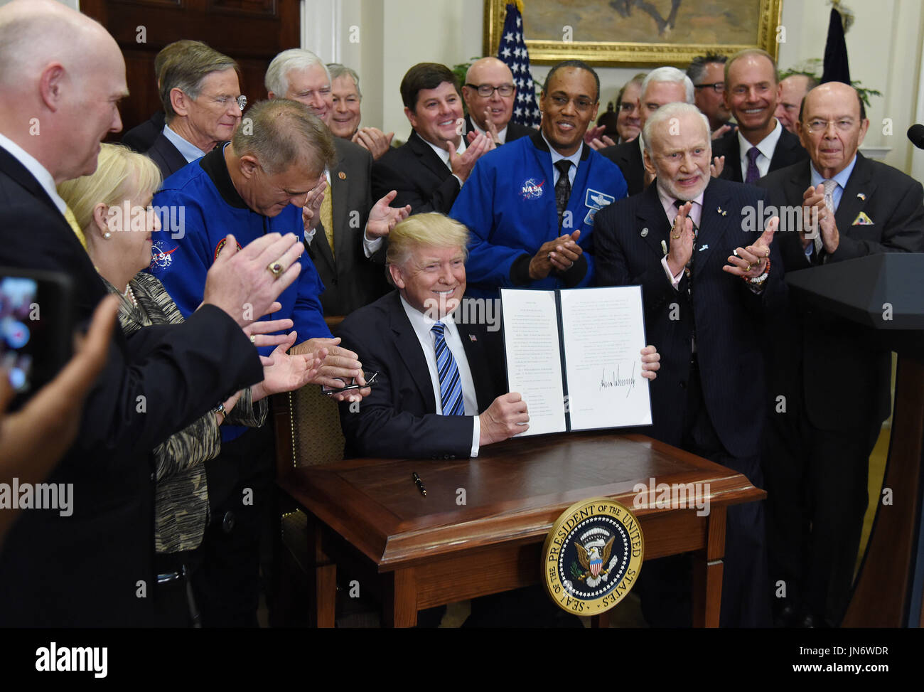 United States President Donald J. Trump, signs an Executive Order to ...