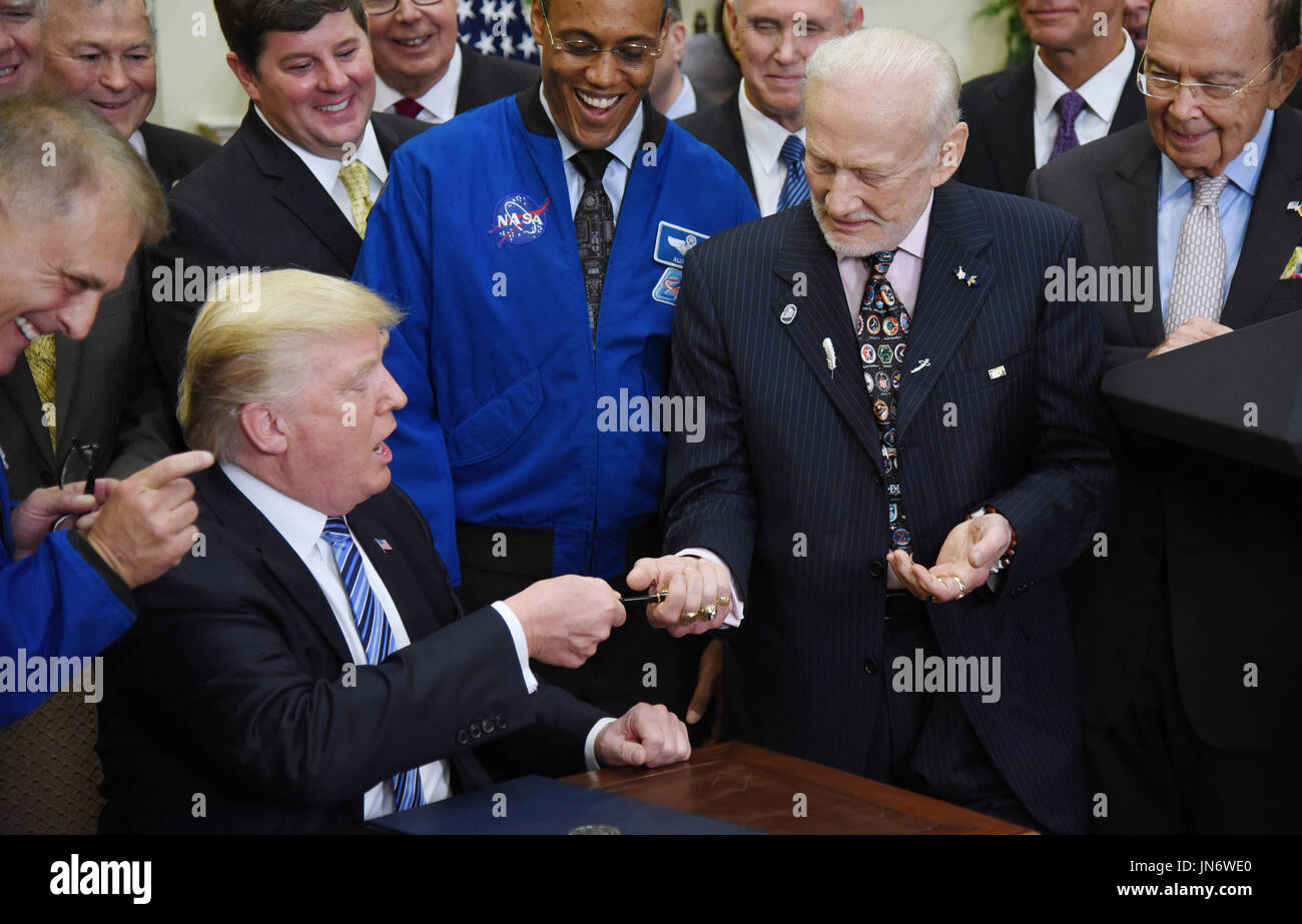 United States President Donald J. Trump, gives the pen to Apollo 11 ...