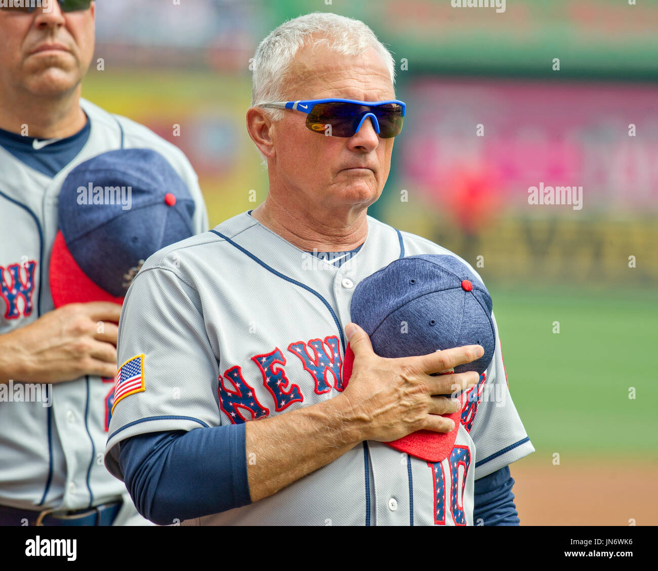 New York Mets manager Terry Collins (10) stands at attention as the ...