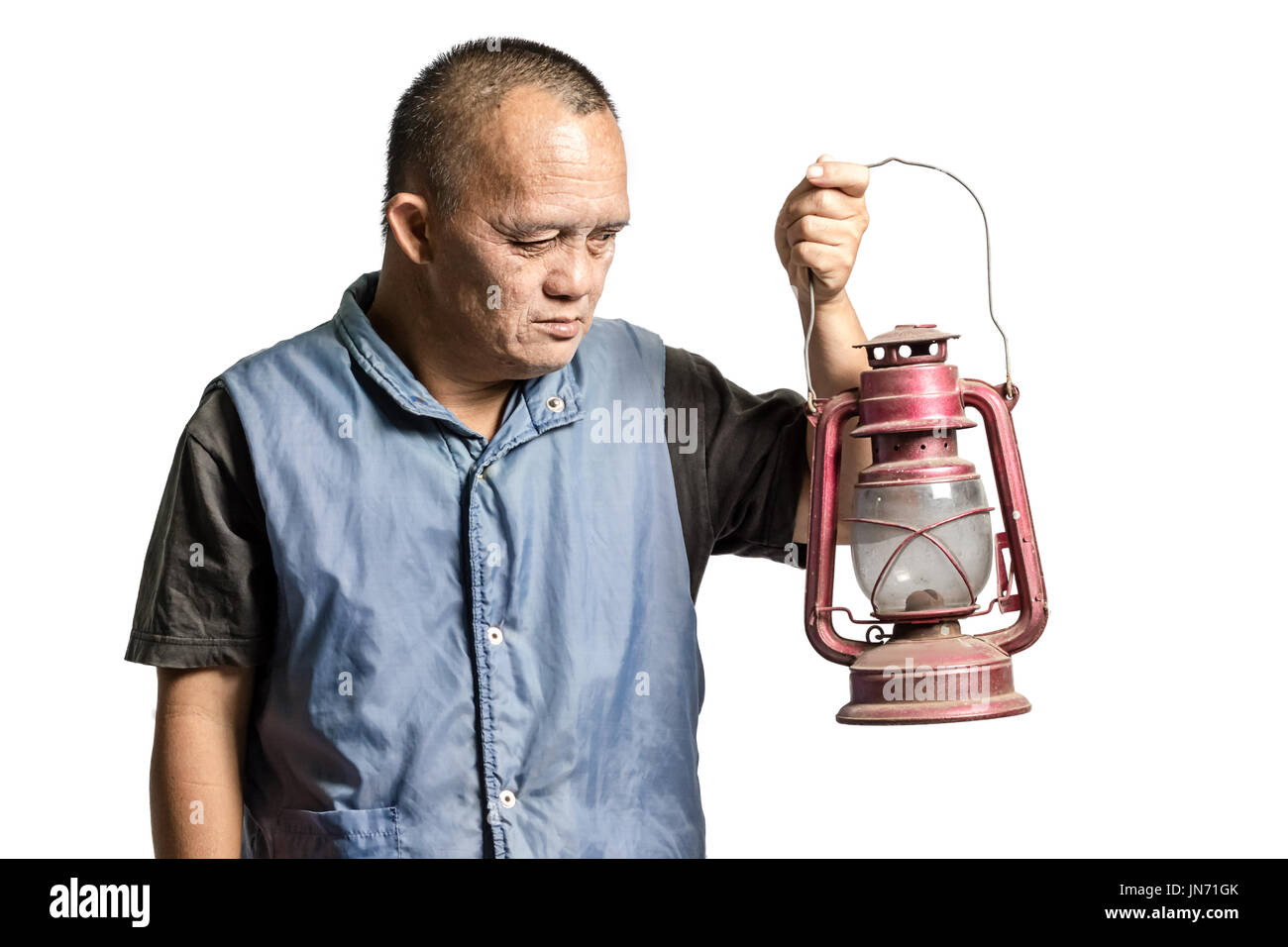 Man holding a lantern hi-res stock photography and images - Alamy