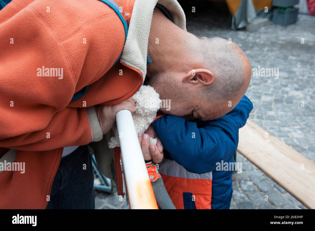 Munich, Germany -September 7th, 2015: Father and son from Syria are ...