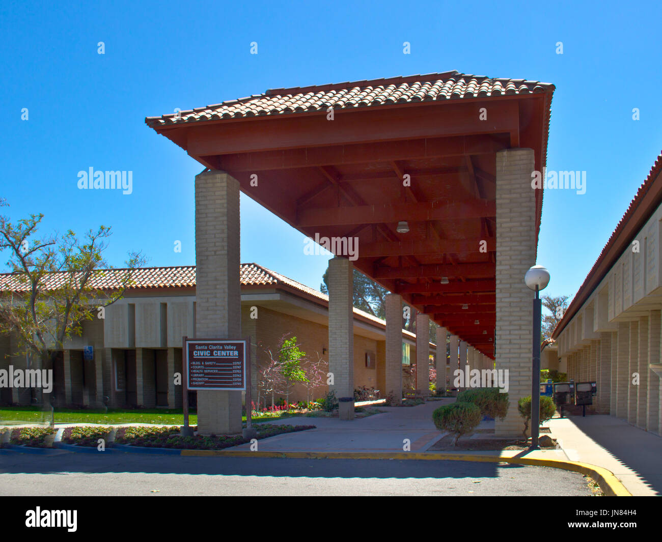 A covered walkway leads to the library in the Santa Clarita Civic ...