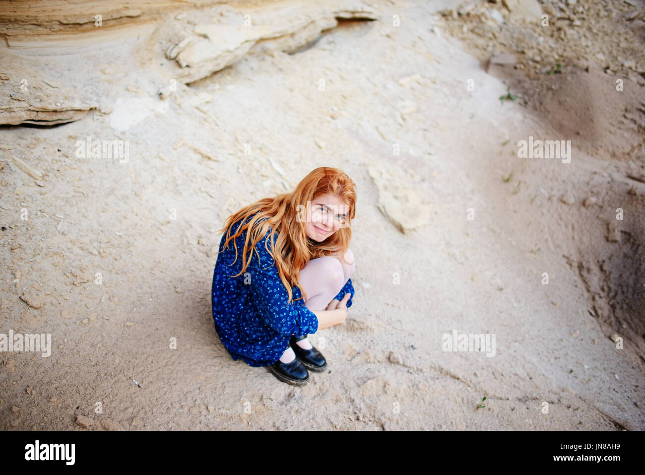 Woman hugging herself sad hi-res stock photography and images - Alamy