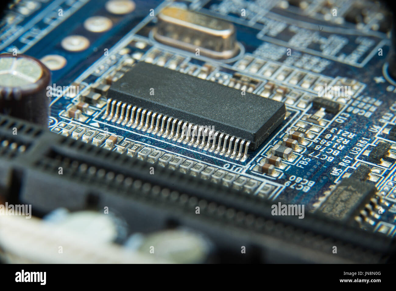 Electronic circuit board close up. Blue PCB Stock Photo - Alamy