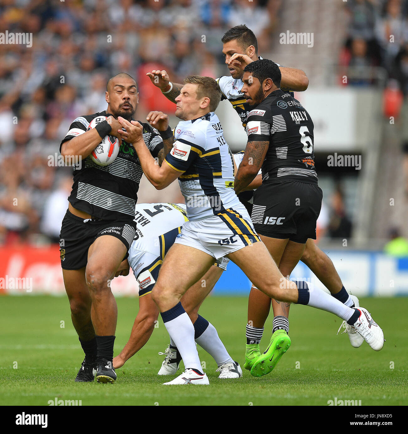 Hull FC's Sika Manu is tackled during the Challenge Cup Semi Final ...