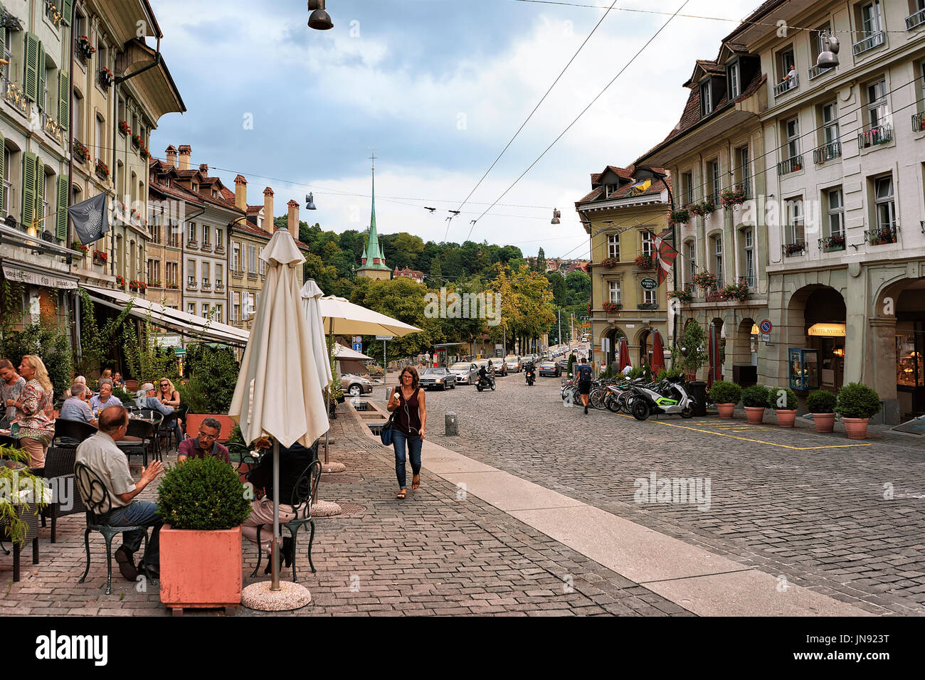Bern, Switzerland - August 31, 2016: People at Cafe on Kramgasse street ...