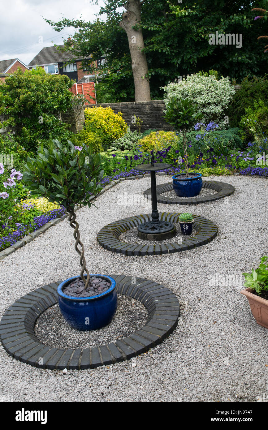 Trees with sun dial hi-res stock photography and images - Alamy