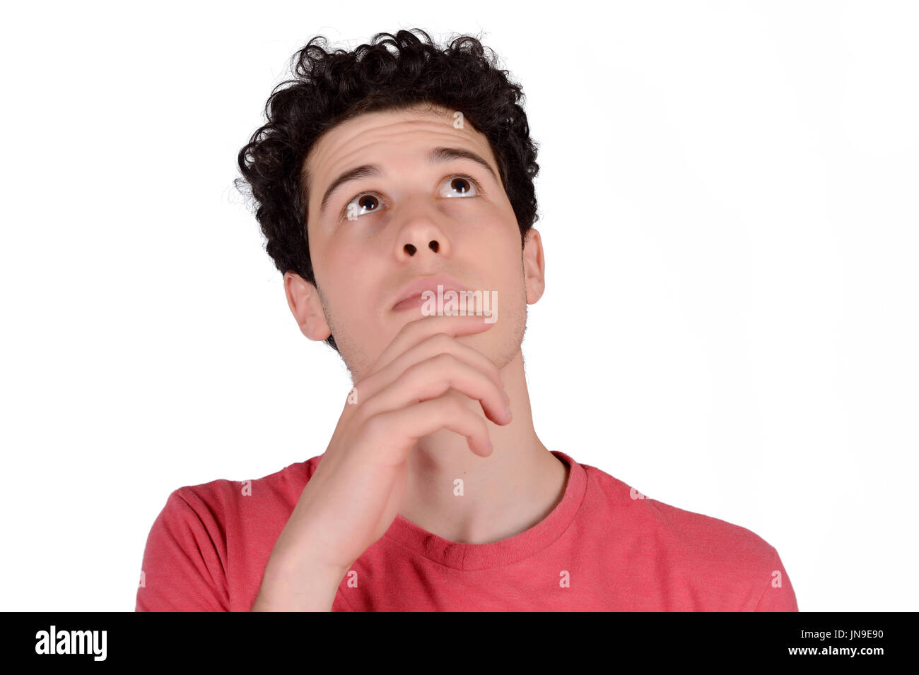 Portrait of a young thoughtful man. Isolated white background Stock ...