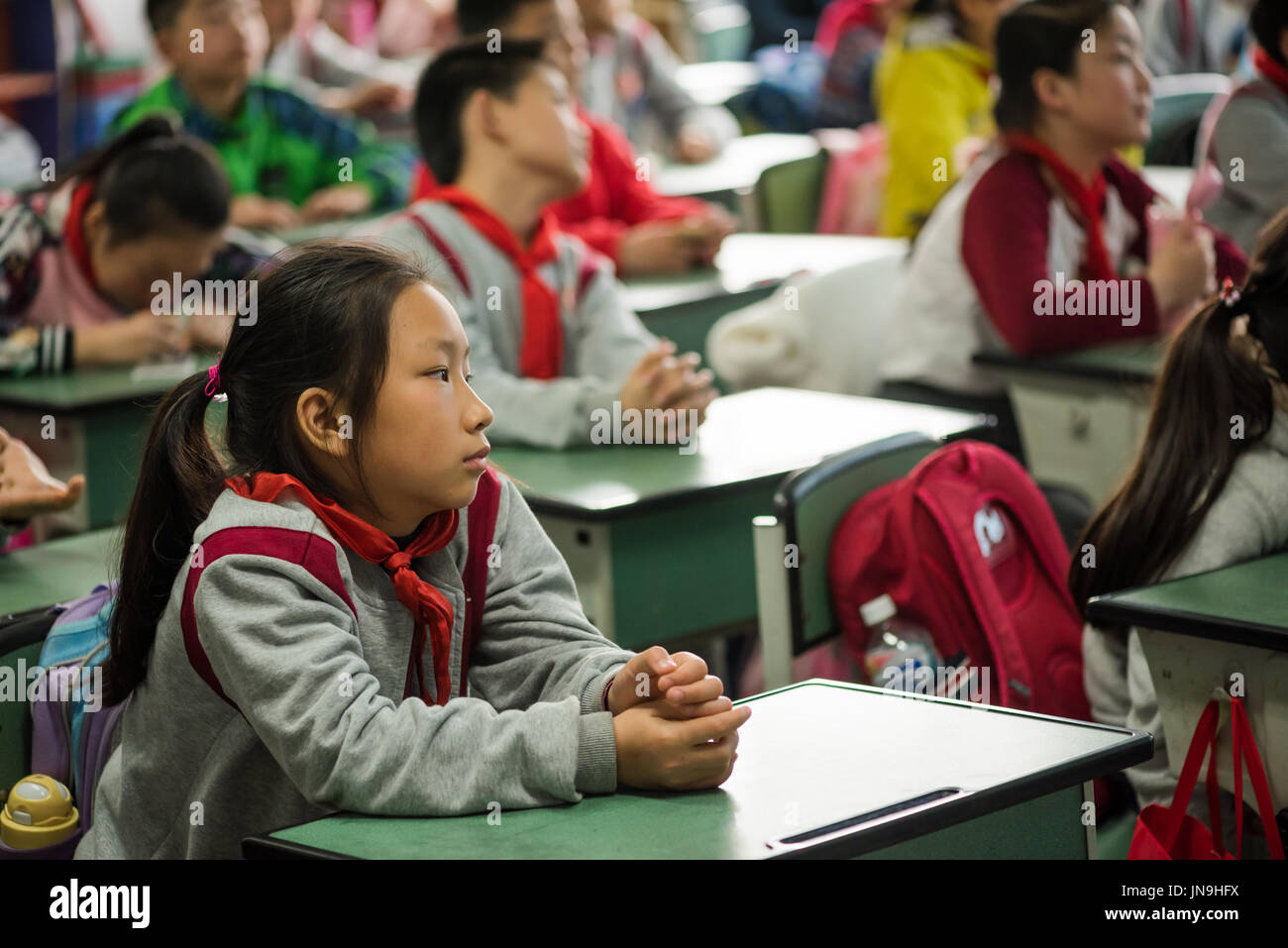 Pupils attend a lesson in a classroom Stock Photo - Alamy