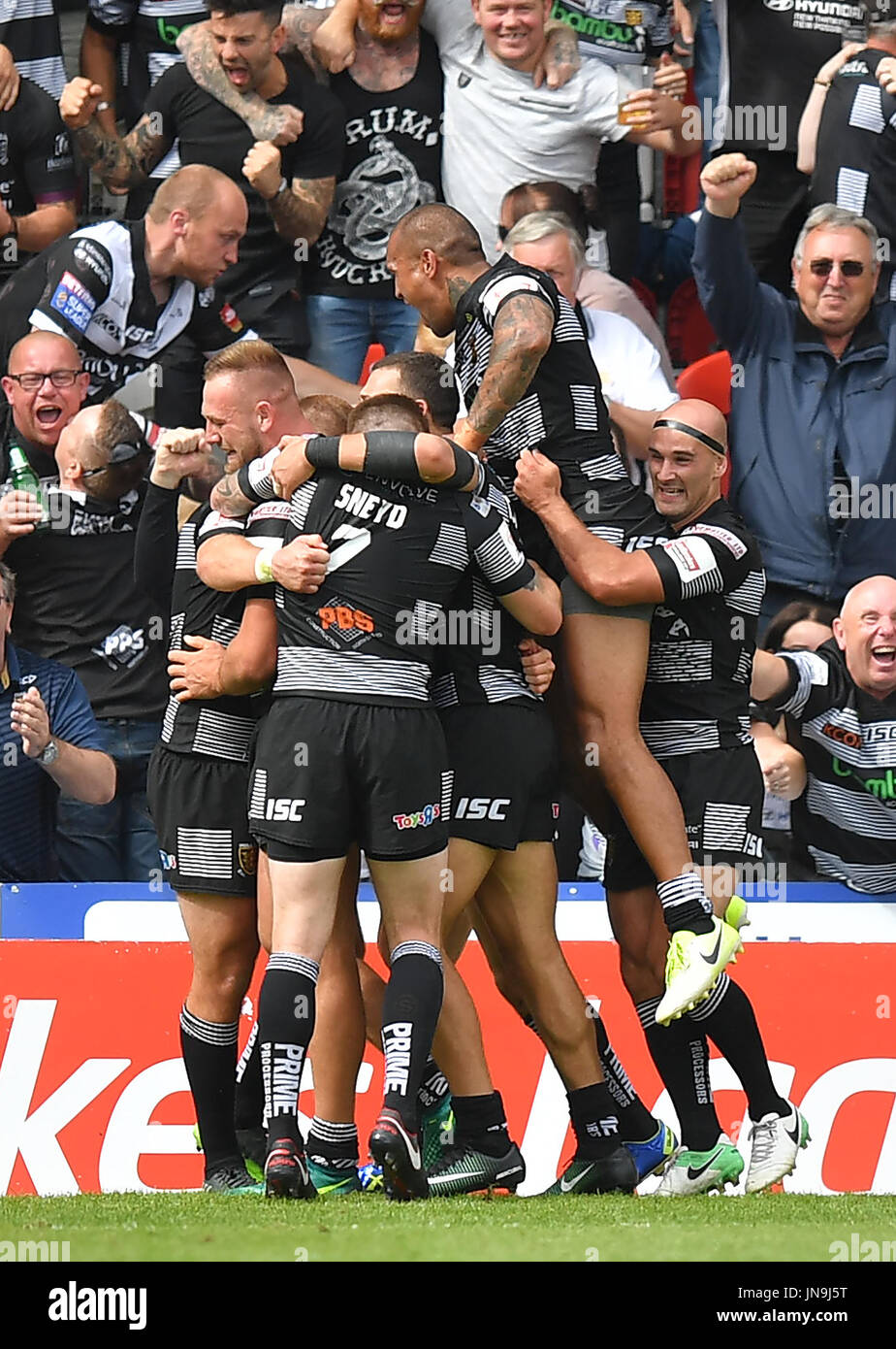 Hull FC players celebrate their fifth try during the Challenge Cup Semi ...