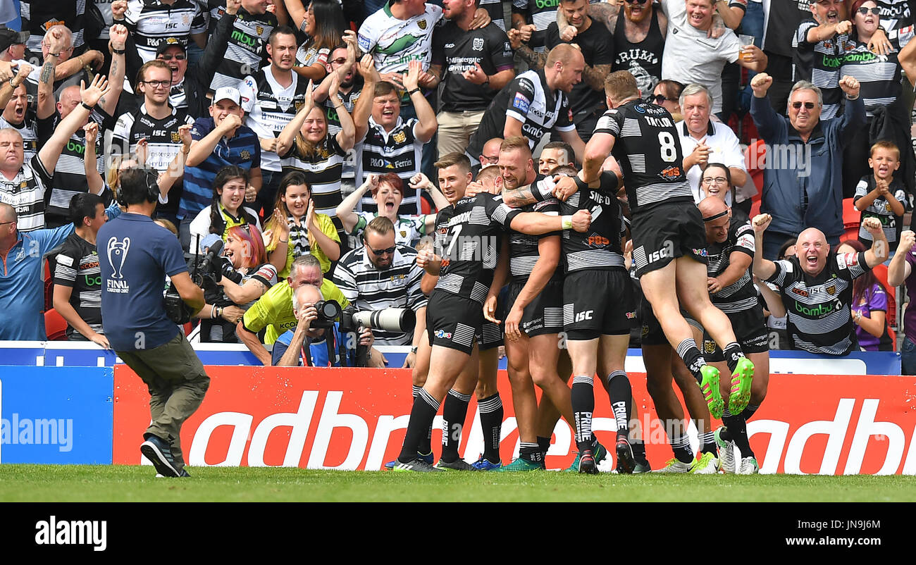 Hull FC players celebrate their fifth try during the Challenge Cup Semi ...