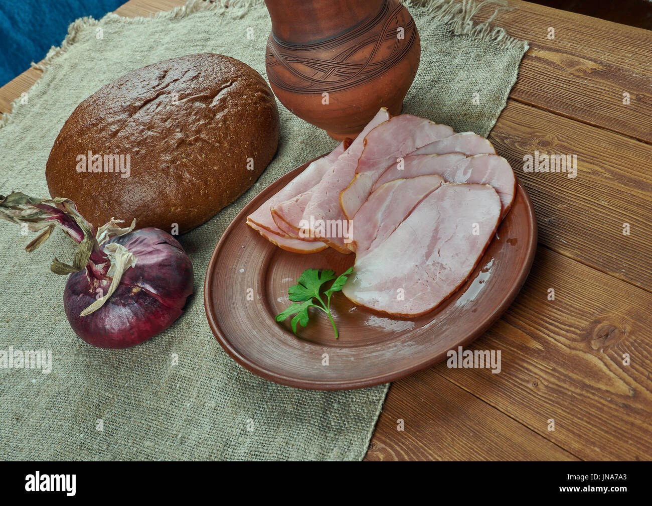 Palvikinkku - Finnish smoked ham. Rustic style Stock Photo - Alamy