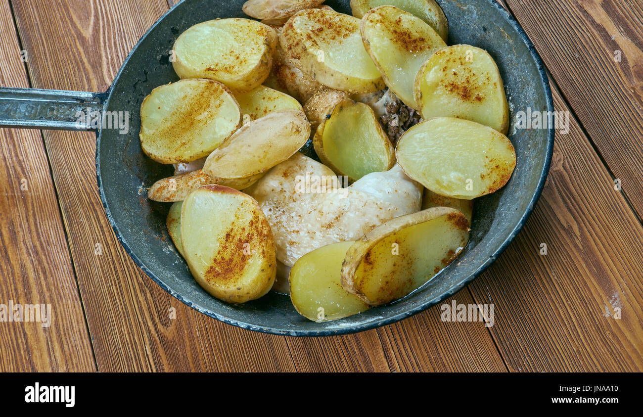 Roasted Duck Legs and Potatoes a frying pan - Duck confit Stock Photo ...