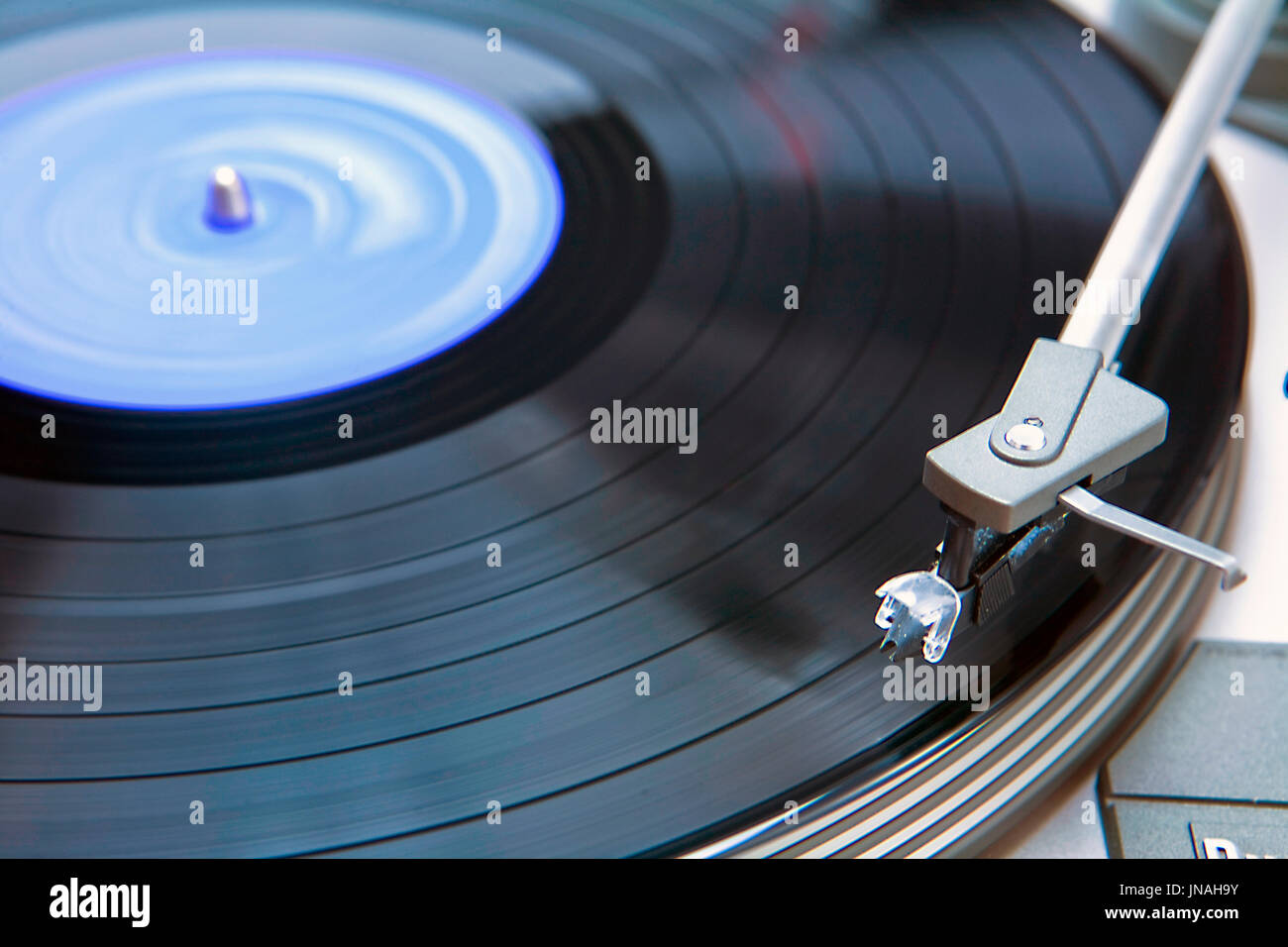 Vintage record player with spinning vinyl Stock Photo - Alamy