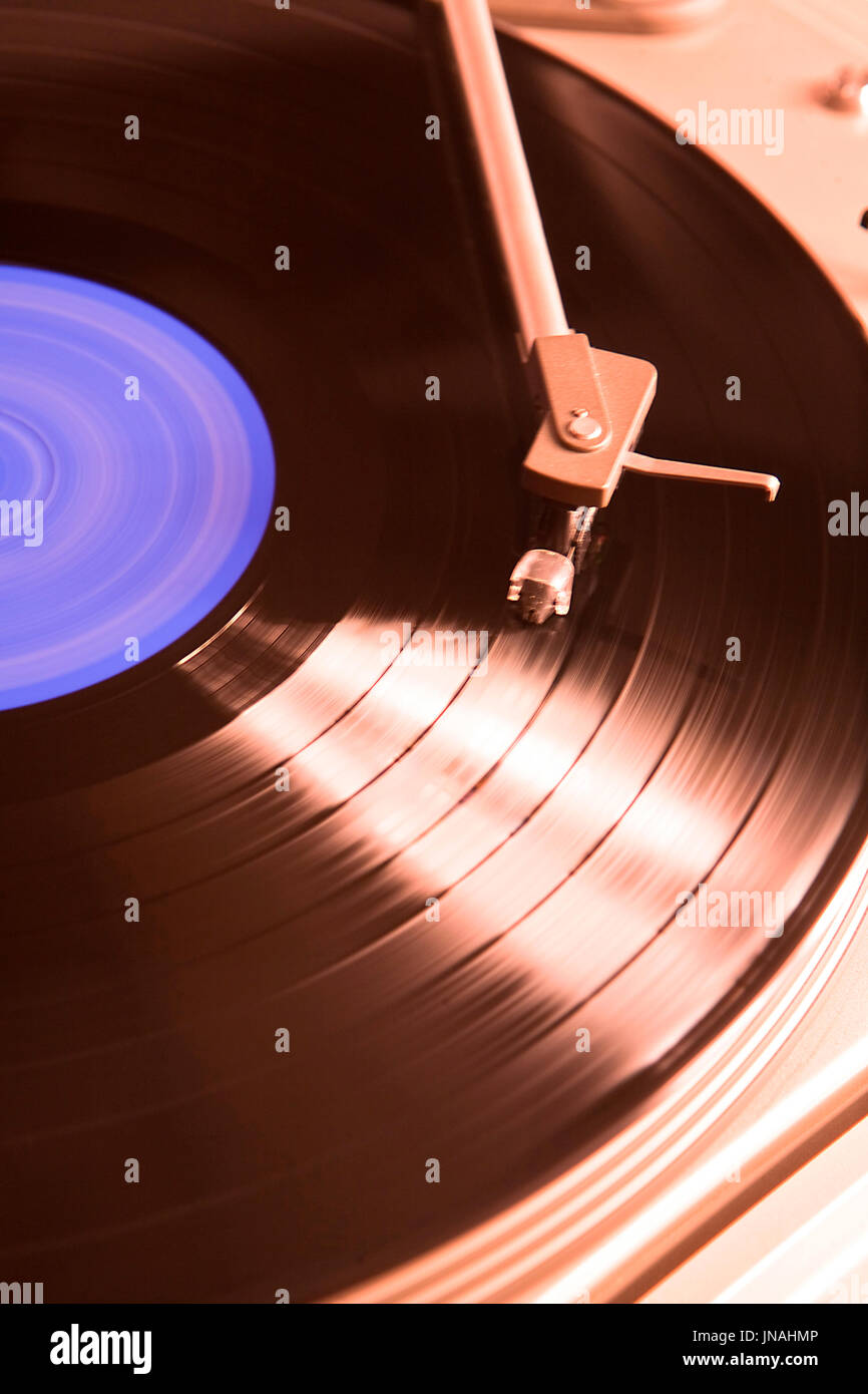 Vintage record player with spinning vinyl Stock Photo - Alamy