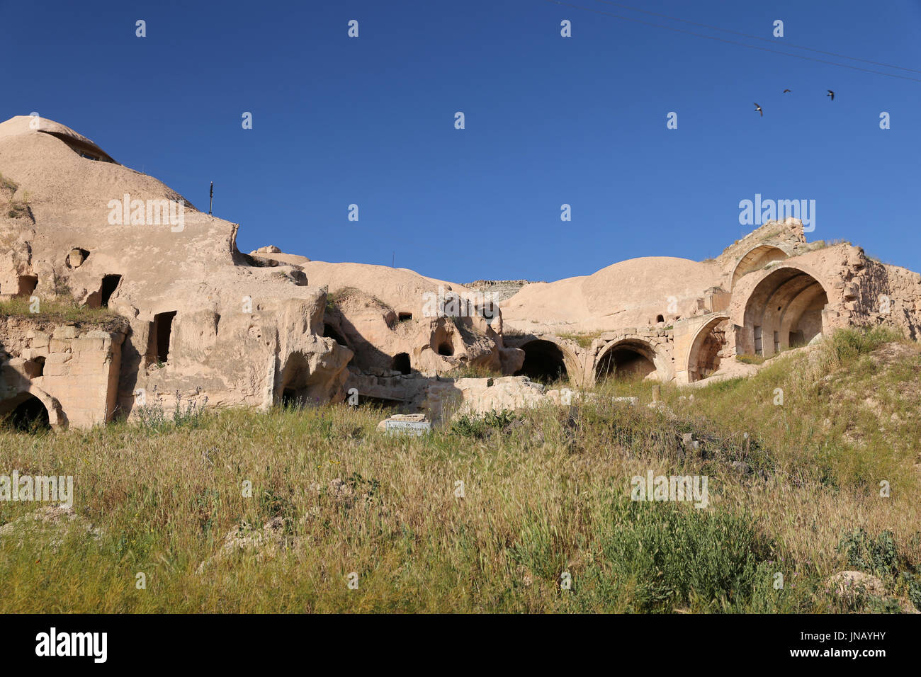 Ruins in Cavusin Village, Cappadocia, Nevsehir City, Turkey Stock Photo ...