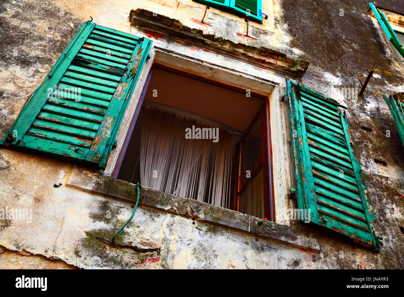Wide open window of old house Stock Photo - Alamy