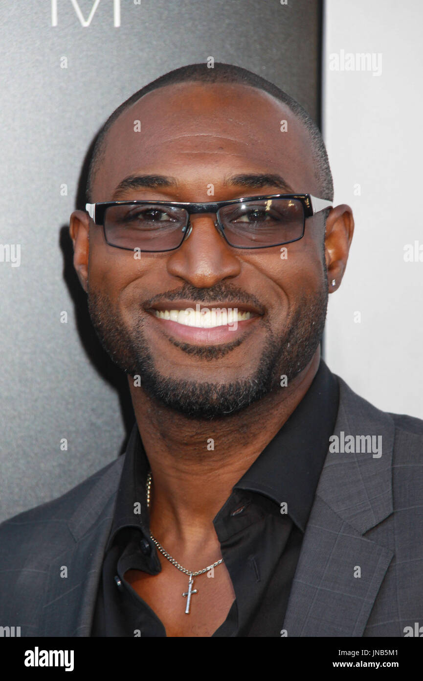 Adrian Holmes 08/07/2013 "Elysium" Premiere held at Regency Village ...