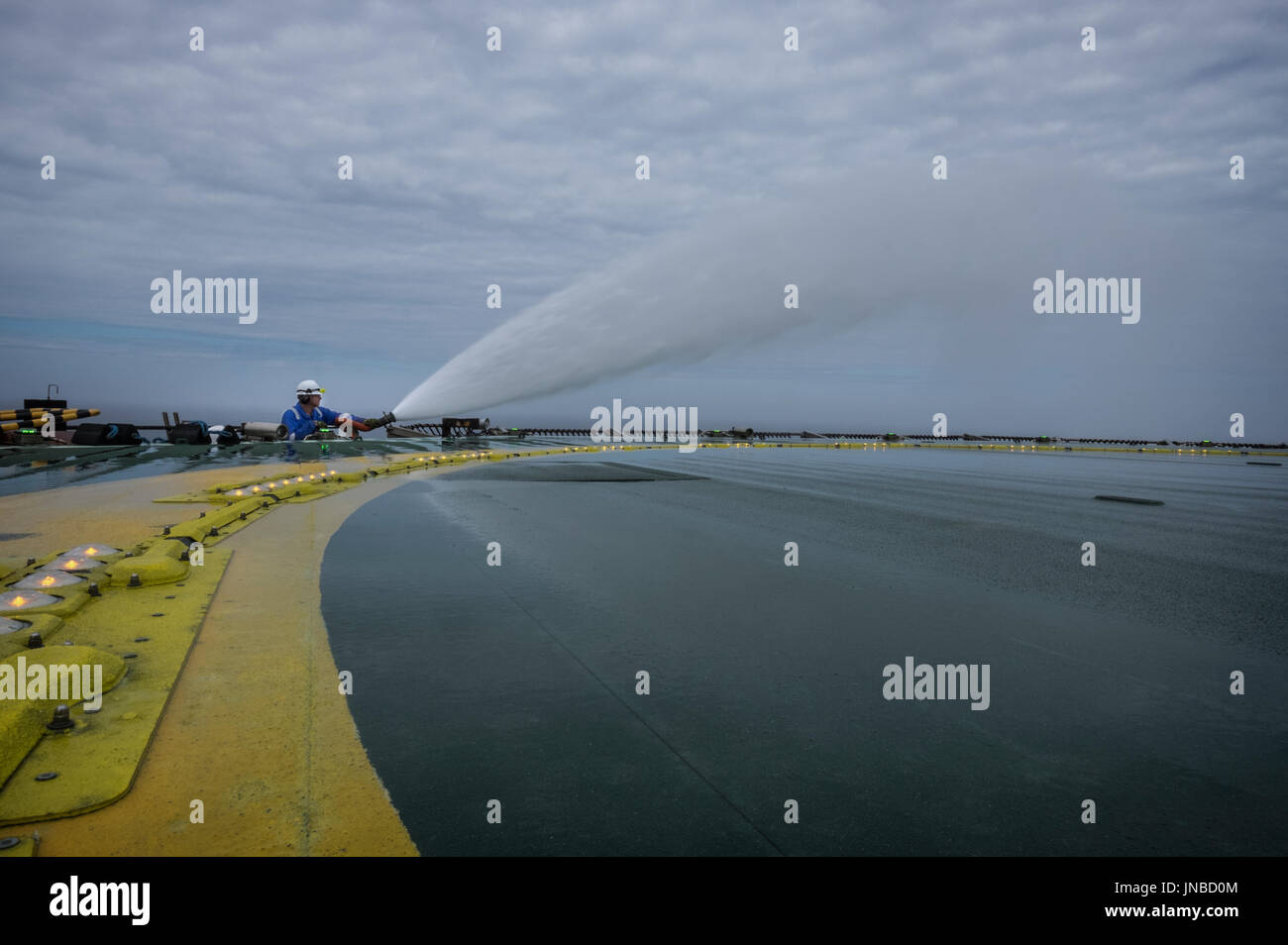 Offshore Heli deck assistant, testing the fire water monitors, credit ...