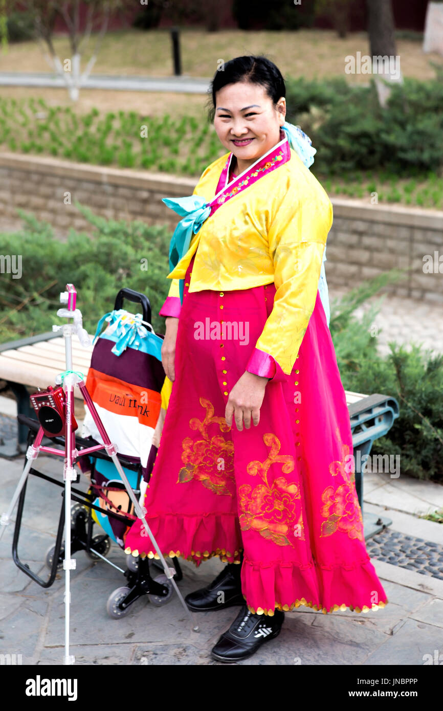 Chinese woman in traditional outfit, Frobidden City, Beijing, China ...