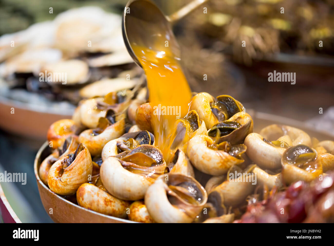 Bowl of cooked snail soup on Chinese street food market, Wangfujing ...