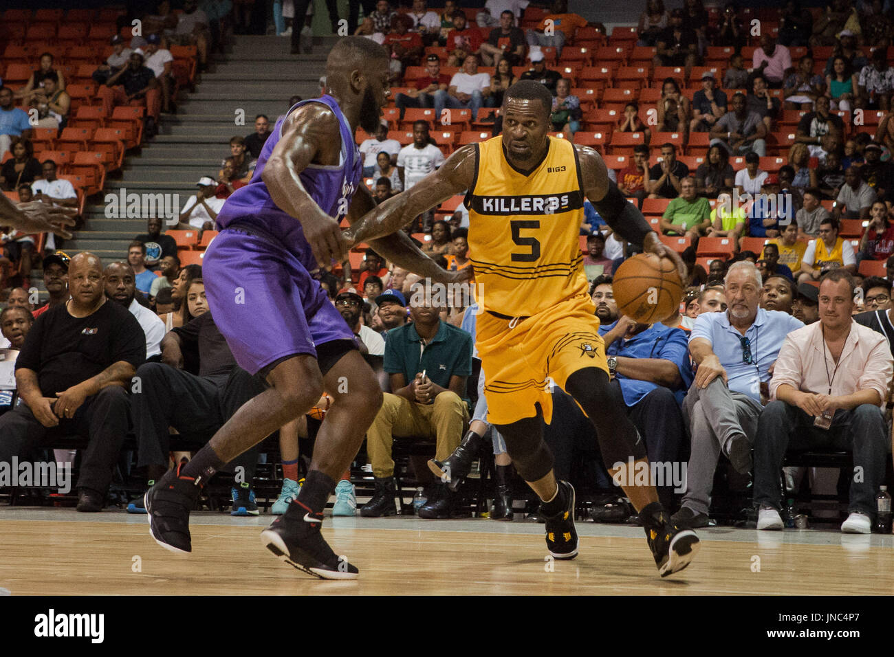 Stephen Jackson #5 Killer 3s dribbles attempts to push past Ivan ...