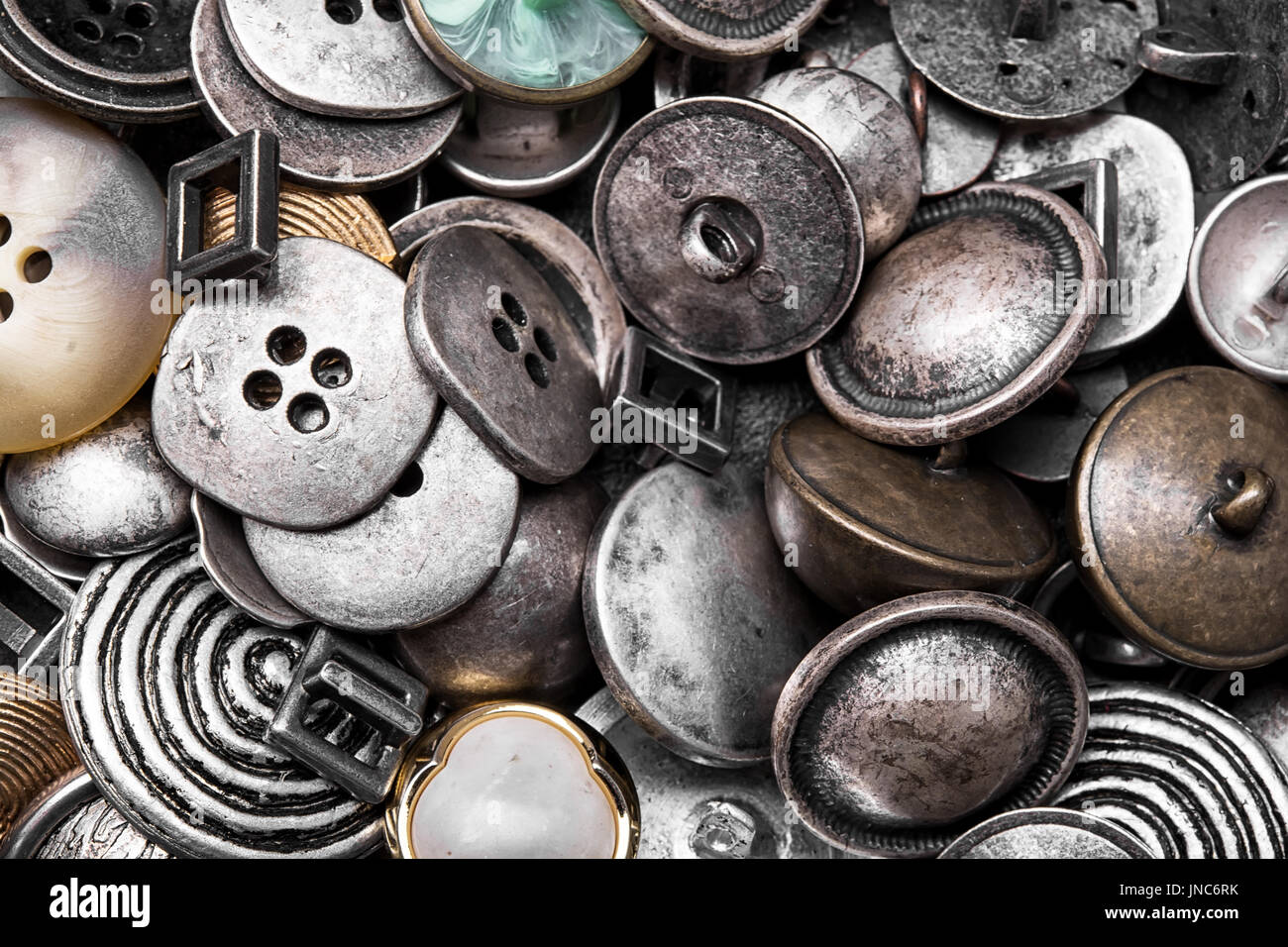 Large set of stylish old-fashioned metal buttons for clothes Stock ...