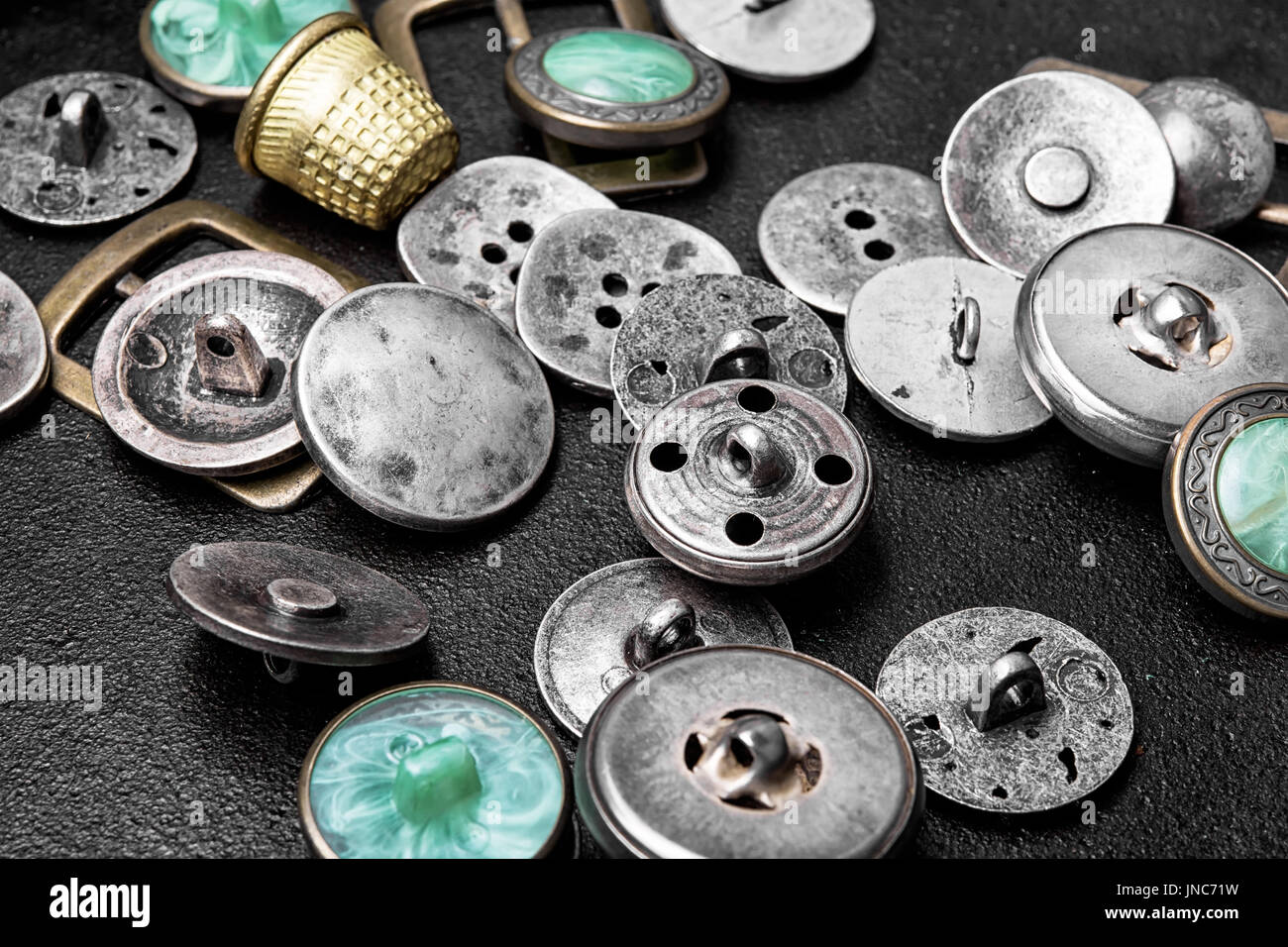 Large set of stylish old-fashioned metal buttons for clothes Stock ...