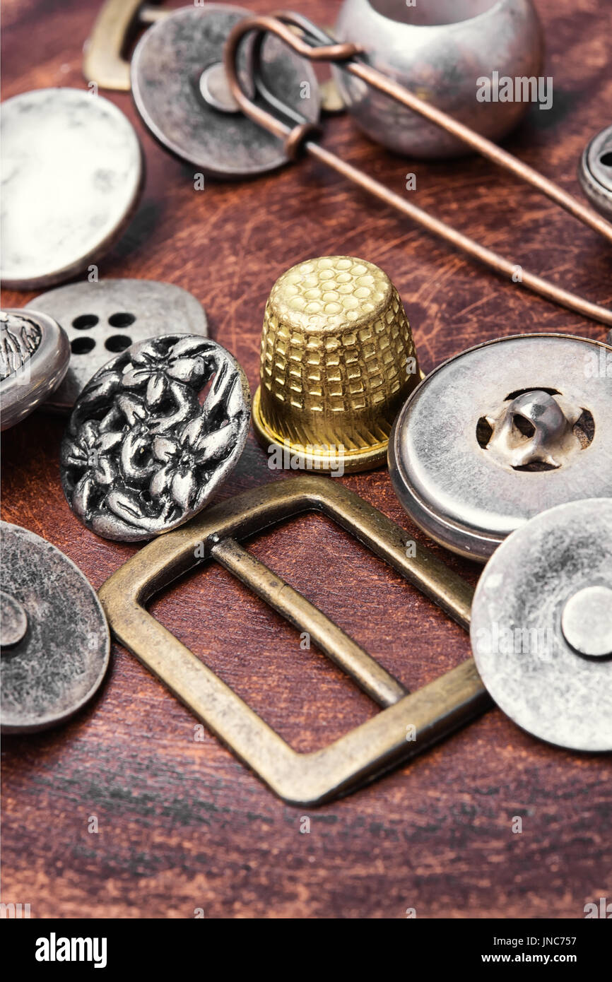 Large set of stylish old-fashioned metal buttons for clothes Stock ...