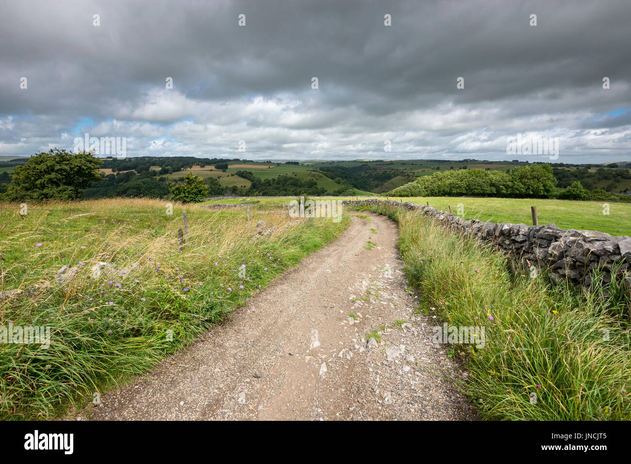 English country lane in the Peak District, Derbyshire, England Stock ...