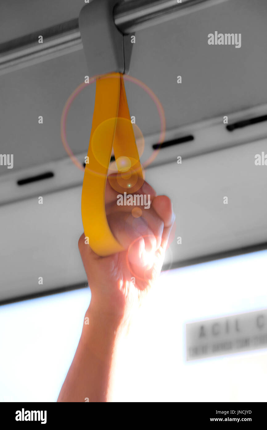 Holding hand on the bus hi-res stock photography and images - Alamy