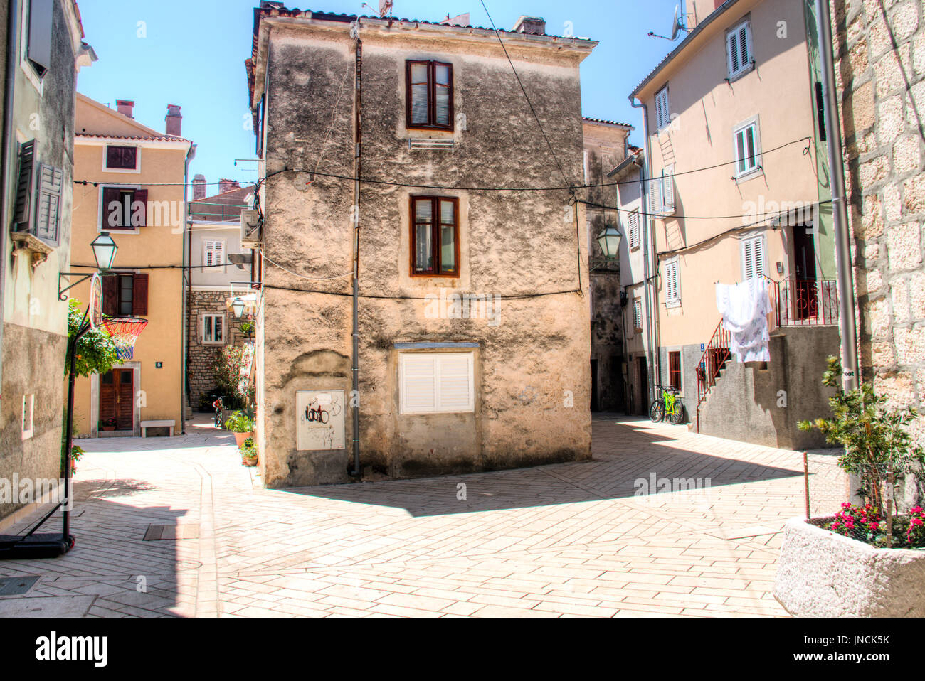 Typical buildings of the fishing village Cres on Cres island in Croatia ...