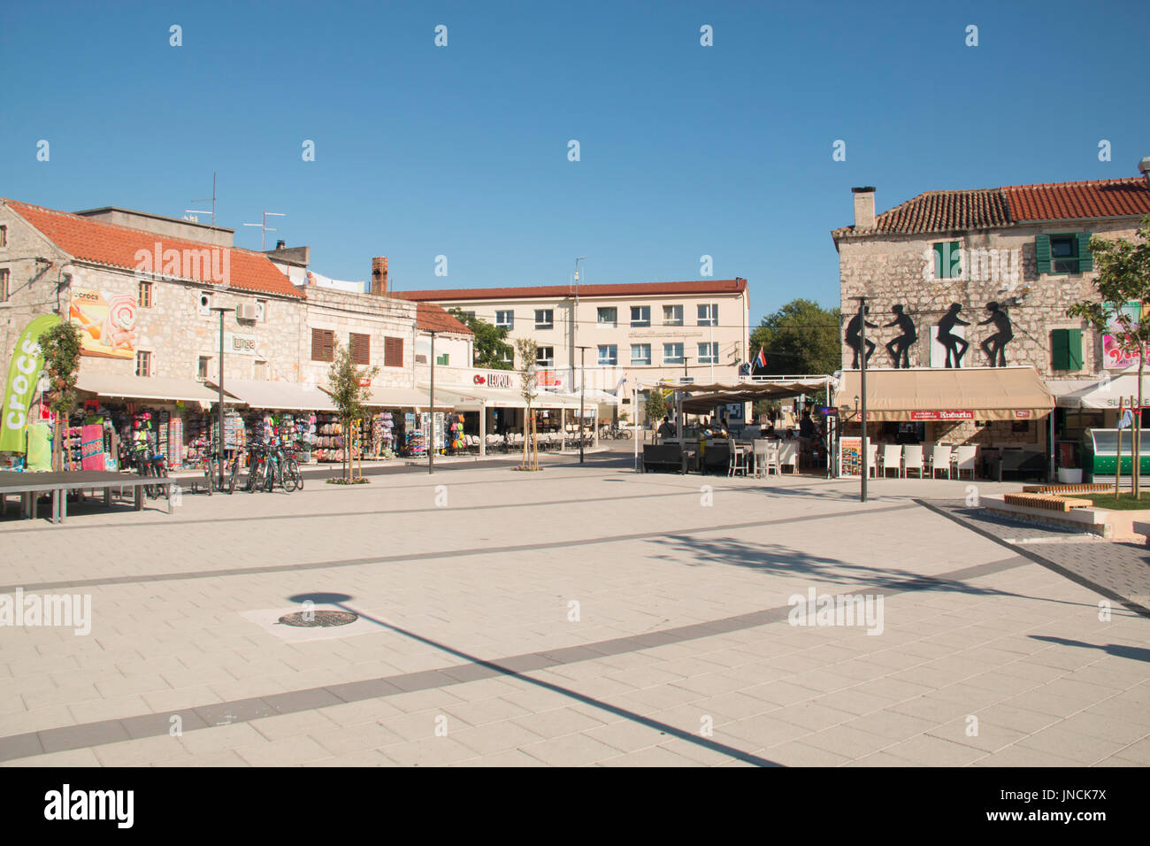 Main square of the fishing village Murter on Murter island in Croatia ...