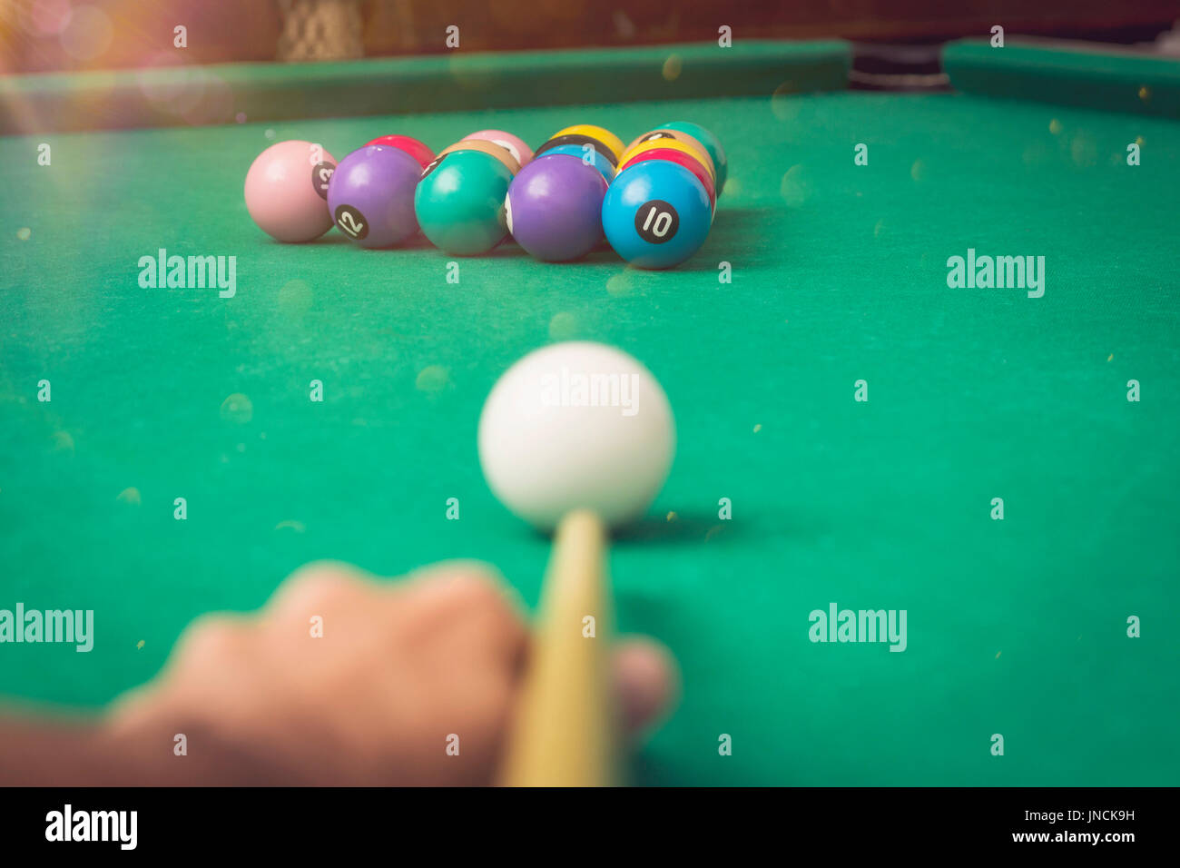 Man playing billiards green billiard hi-res stock photography and ...