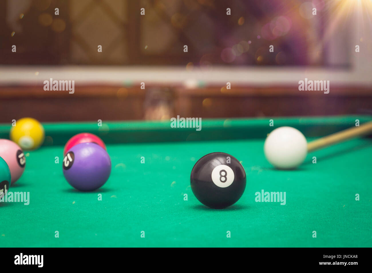 Billiard Balls in a pool table Stock Photo - Alamy